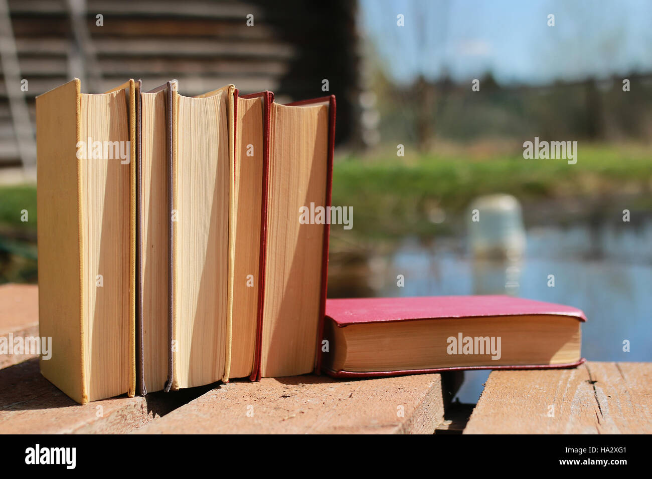 books standing on a table Stock Photo - Alamy