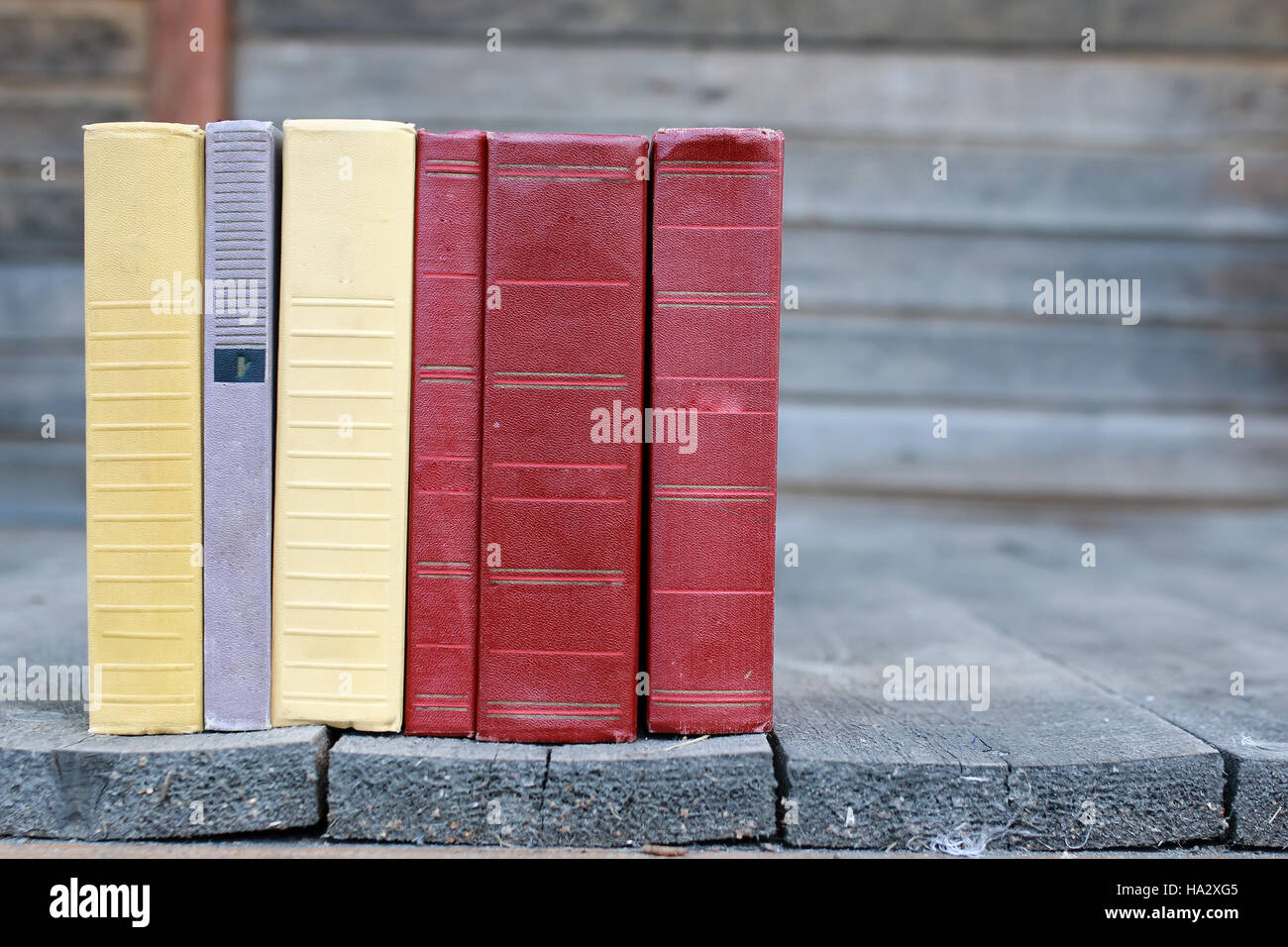 books standing on a table Stock Photo - Alamy