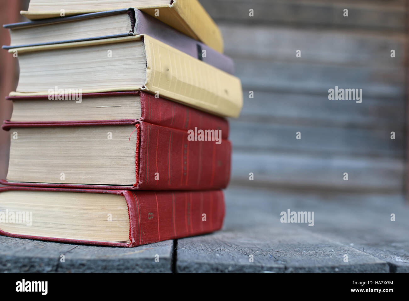 books standing on a table Stock Photo - Alamy