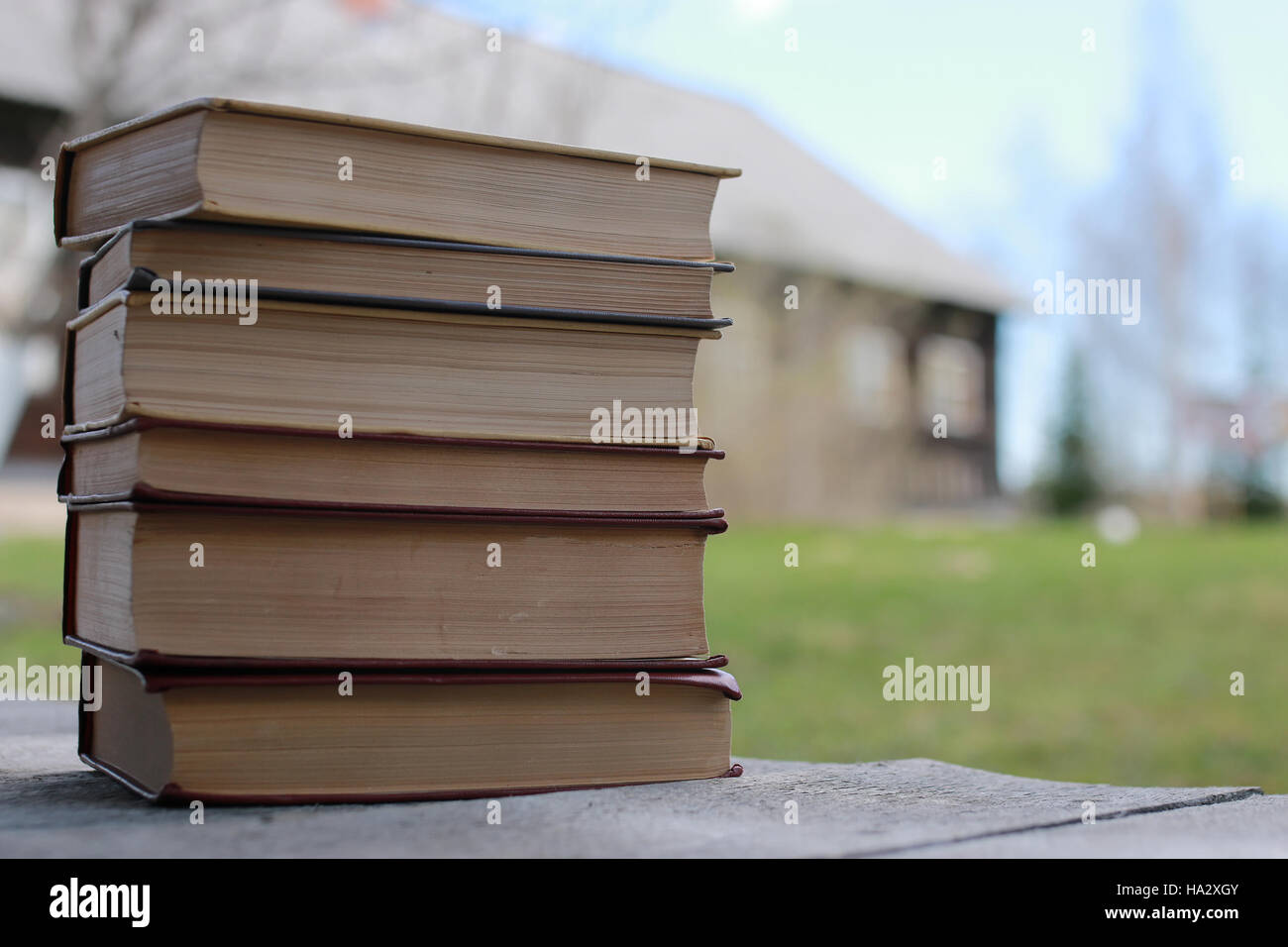books standing on a table Stock Photo - Alamy