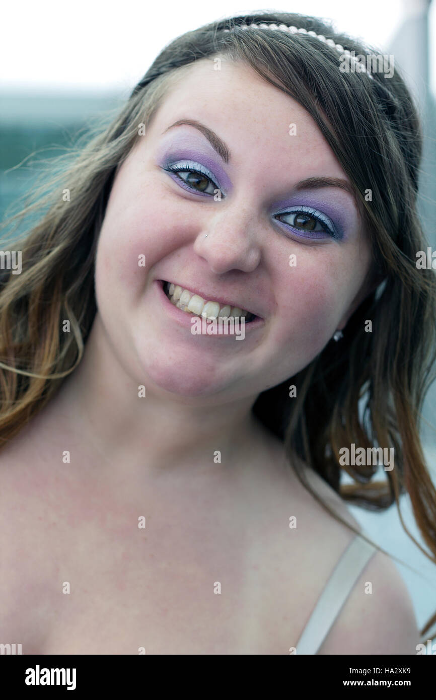 Close up of woman with a goofy grin Stock Photo - Alamy