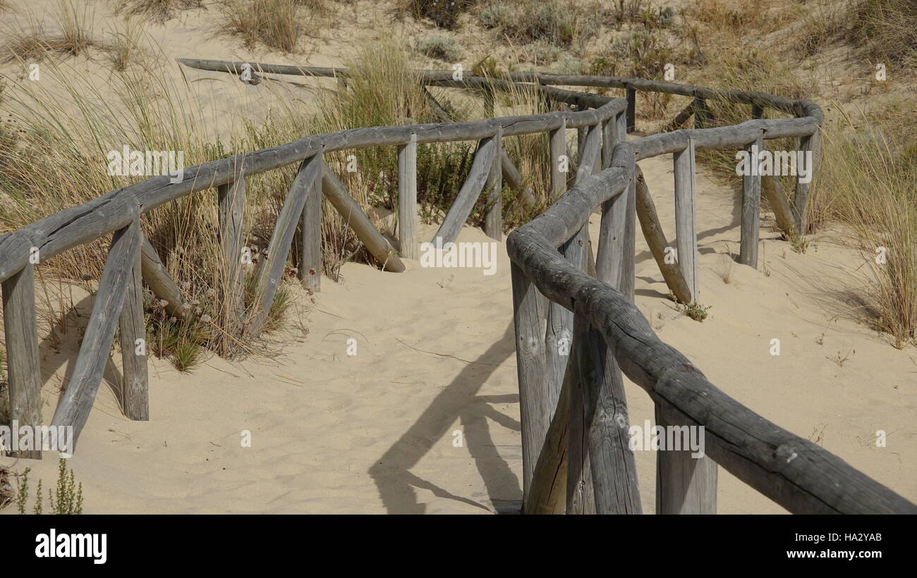 Sand And Footsteps On Pathway Stock Photo - Alamy