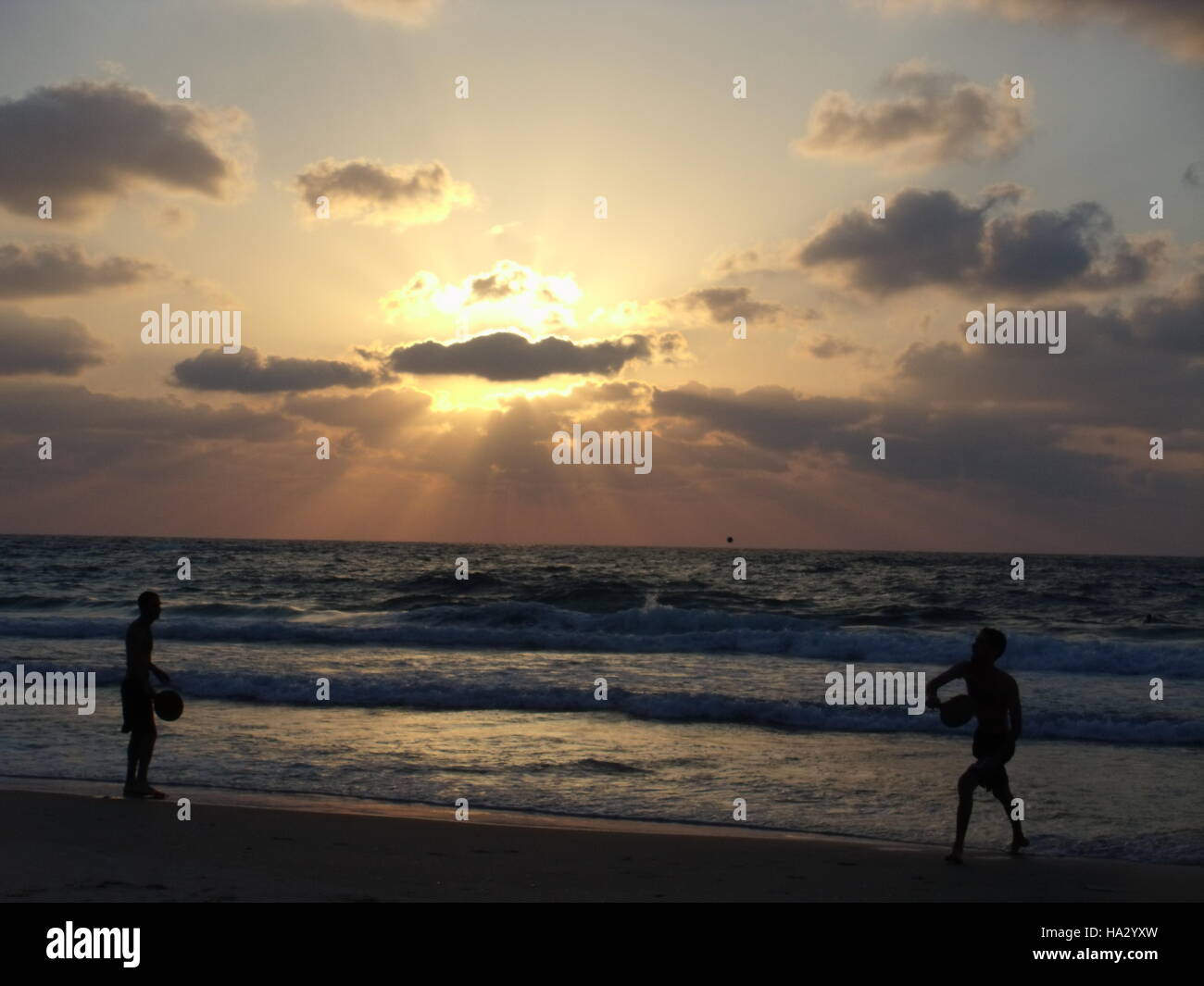 Playing at the Beach Stock Photo - Alamy