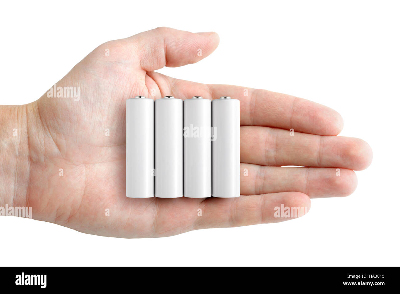 Batteries in hand isolated on white background Stock Photo - Alamy