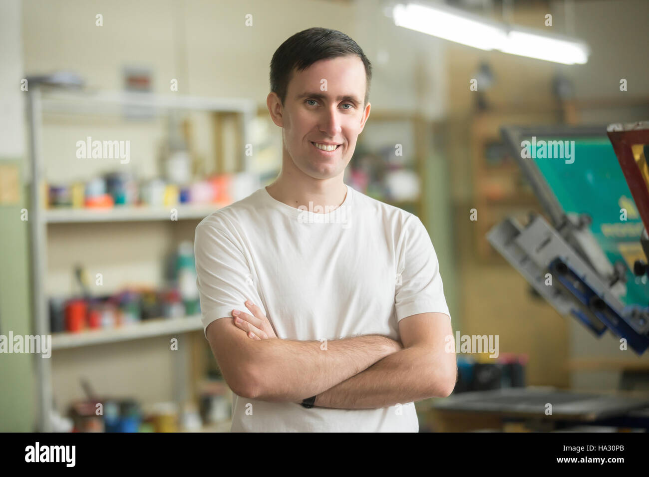 Portrait of a young confident worker Stock Photo - Alamy