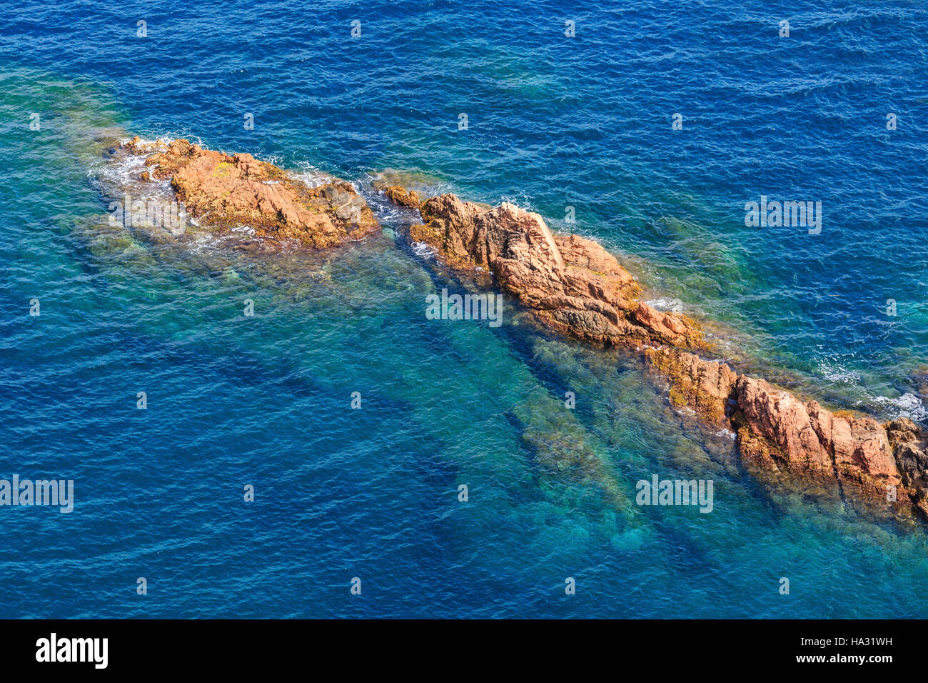 Rock in clear sea water near shore. View from above Stock Photo - Alamy