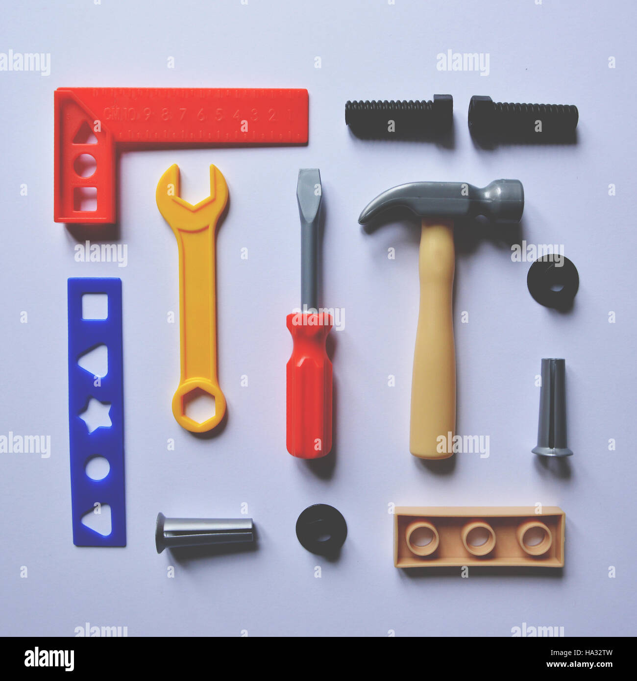 Flat lay of children plastic toy tools Stock Photo - Alamy
