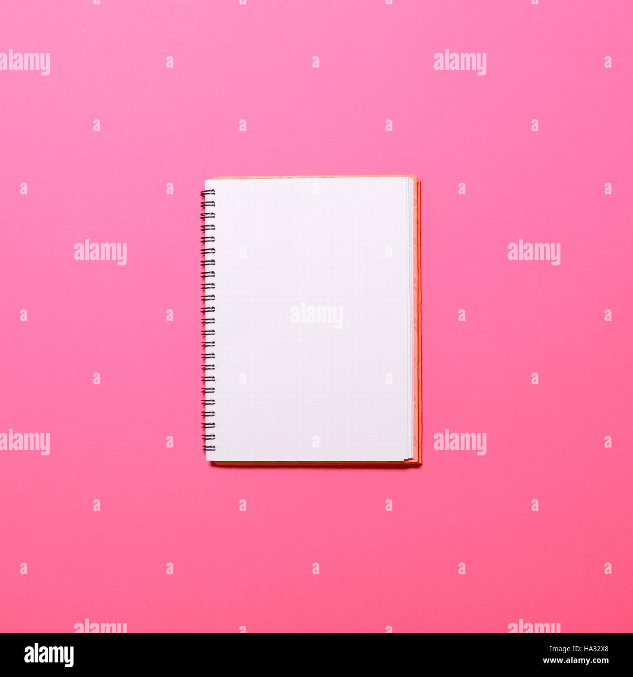 Blank notebook page on pink background - Flat lay Stock Photo - Alamy