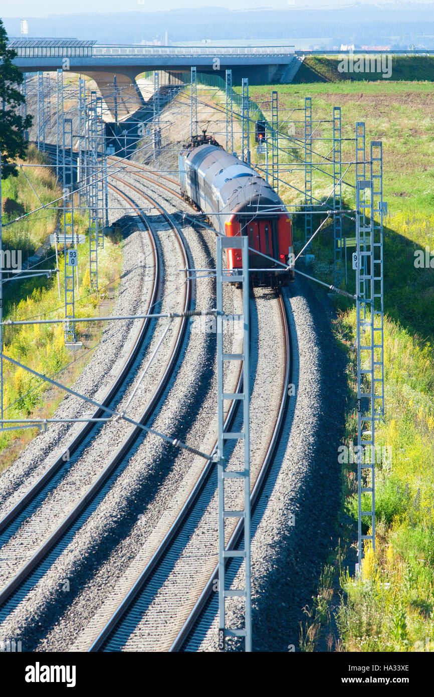 Modern Passenger Train Riding through Countryside Stock Photo - Alamy