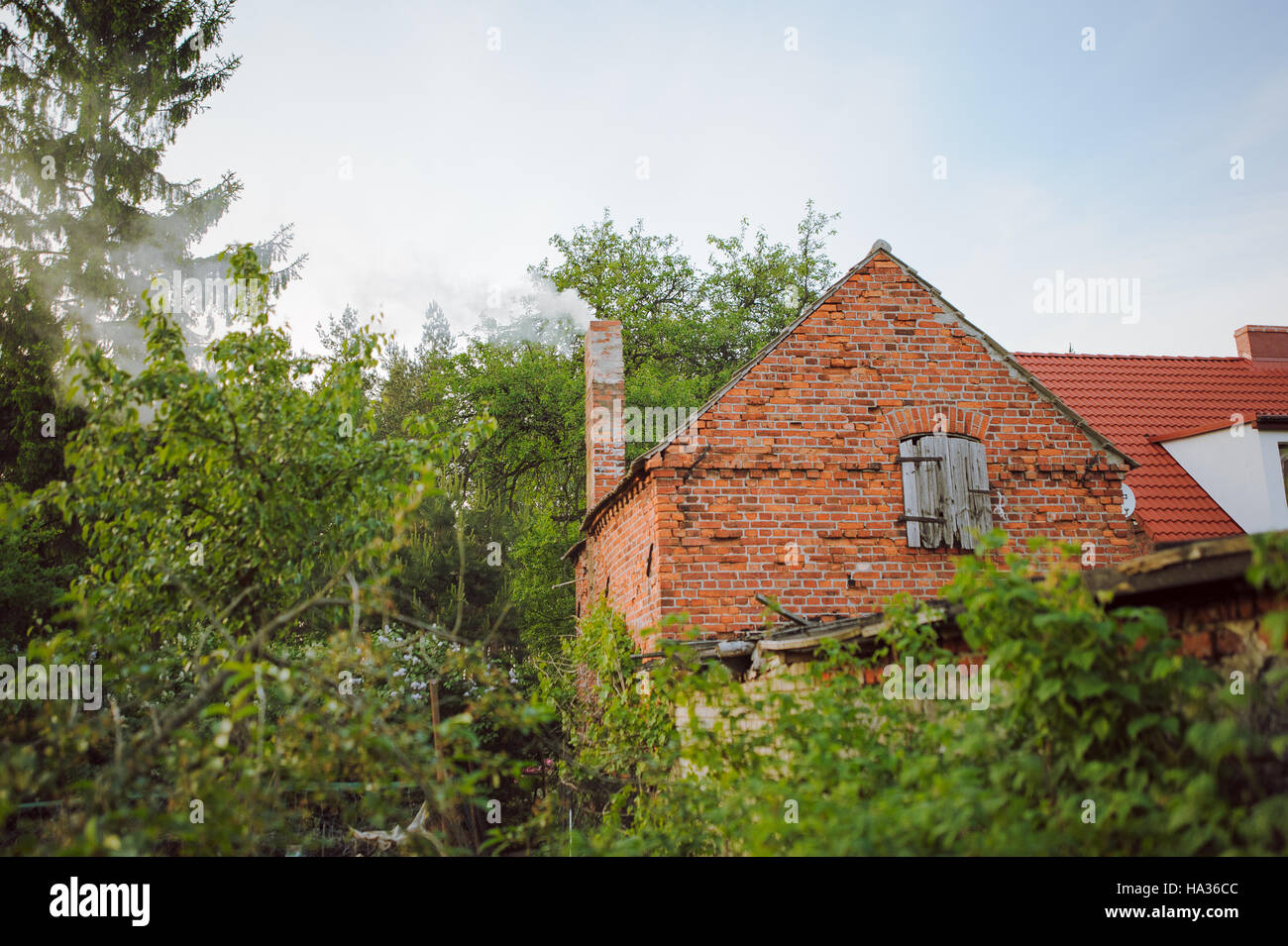Old brick cottage in a small town Stock Photo - Alamy
