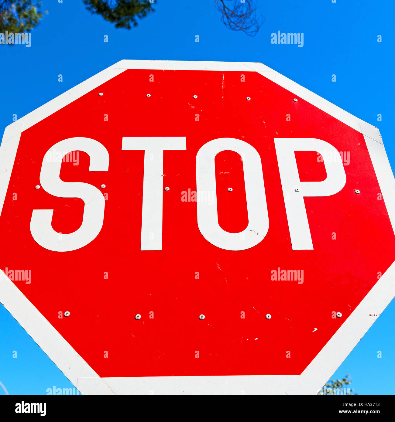 the stop signal write in south africa and sky Stock Photo - Alamy