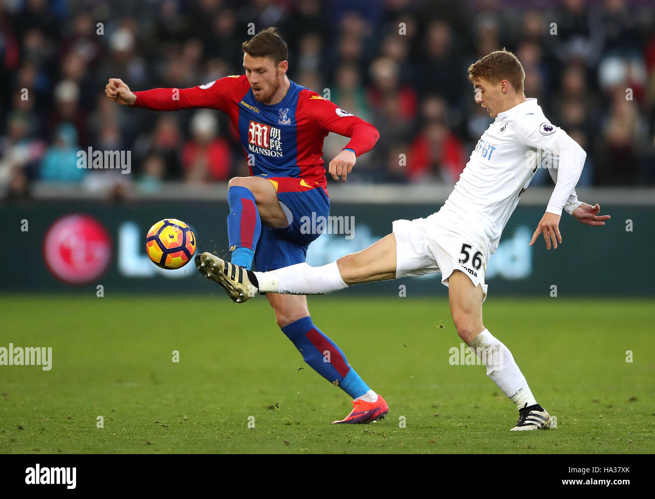 Swansea City's Jay Fulton and Crystal Palace's Connor Wickham battle ...