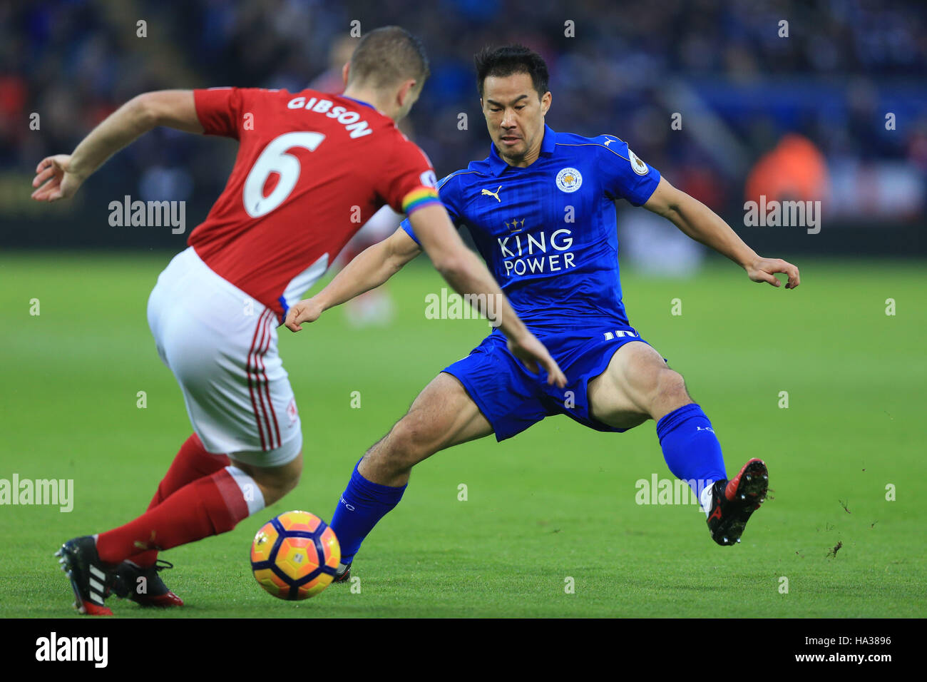 Middlesbrough's Ben Gibson (Left) and Leicester City's Shinji Okazaki ...
