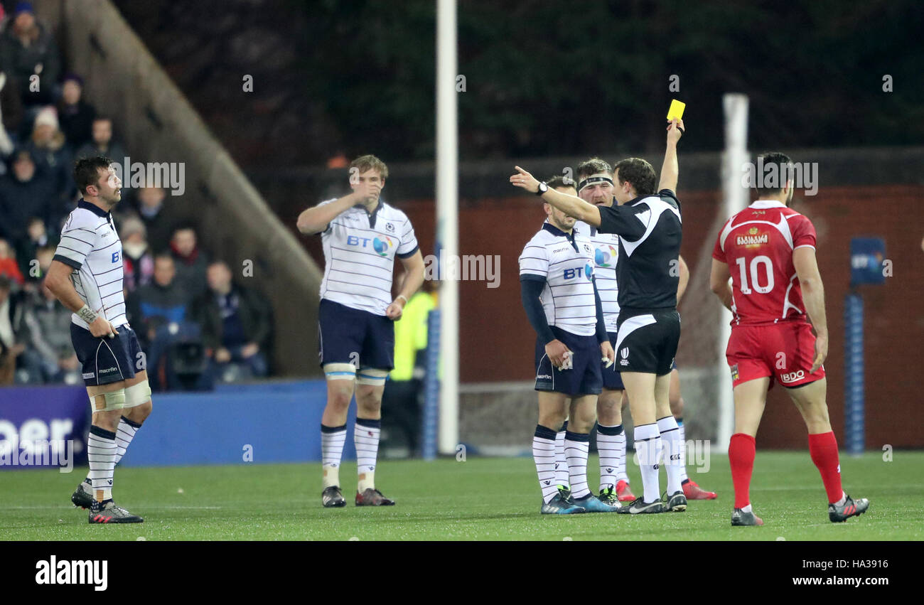 Scotland's Moray Low (third right) is shown a yellow card during the ...