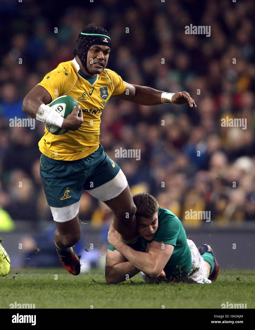 Australia's Henry Speight is tackled by Ireland's Garry Ringrose during ...