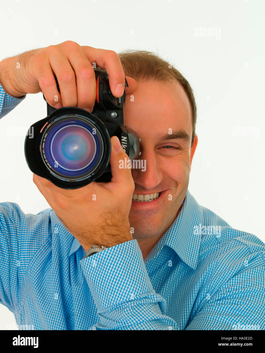 Photographer with a reflex camera Stock Photo - Alamy