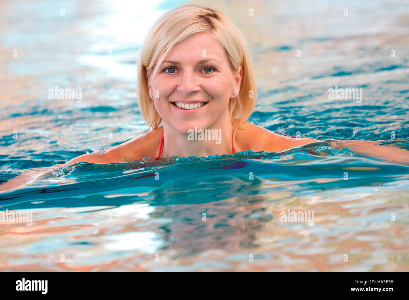 Smiling women indoor swimming pool hi-res stock photography and images ...