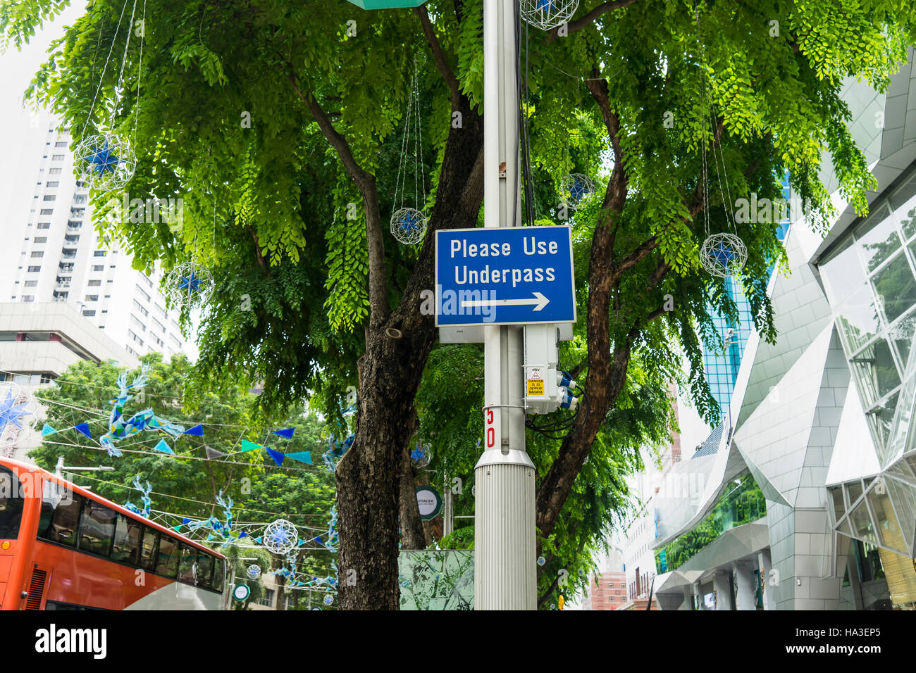 sign of use underpass for cross the road in singapore city - can use to ...