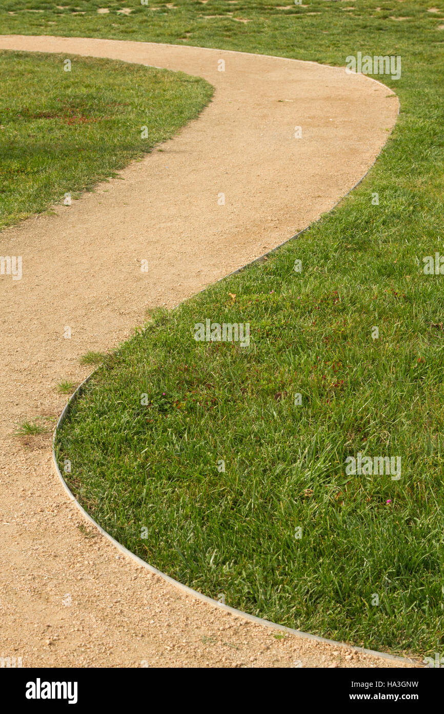 The ground footpath in the grass Stock Photo - Alamy