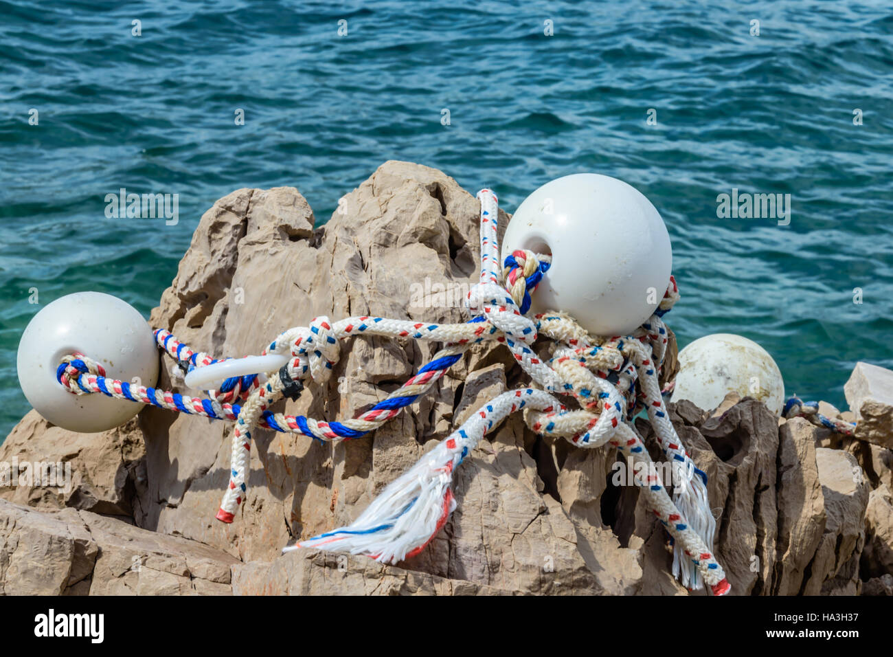 Floating the mark on the rock Stock Photo - Alamy