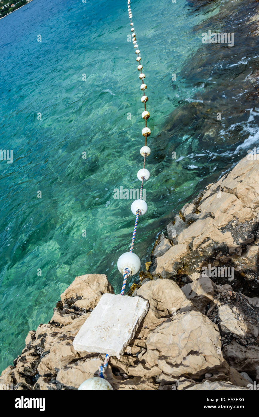 Floating the mark on the sea Stock Photo - Alamy