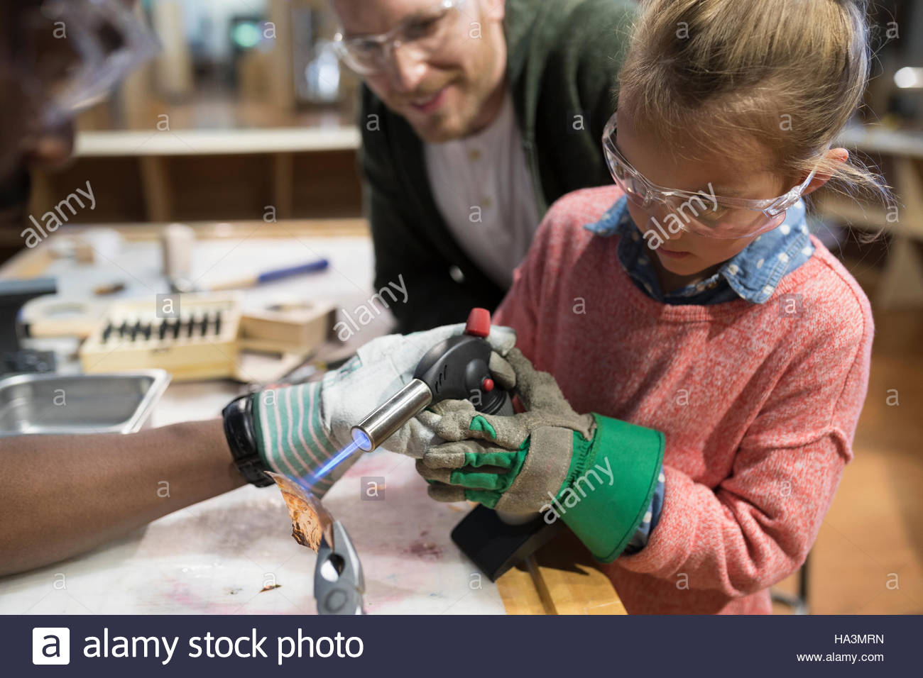Helping scientist hi-res stock photography and images - Alamy
