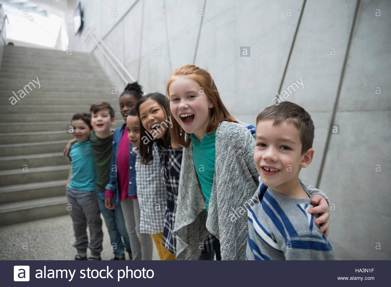 Group children smiling standing hi-res stock photography and images - Alamy