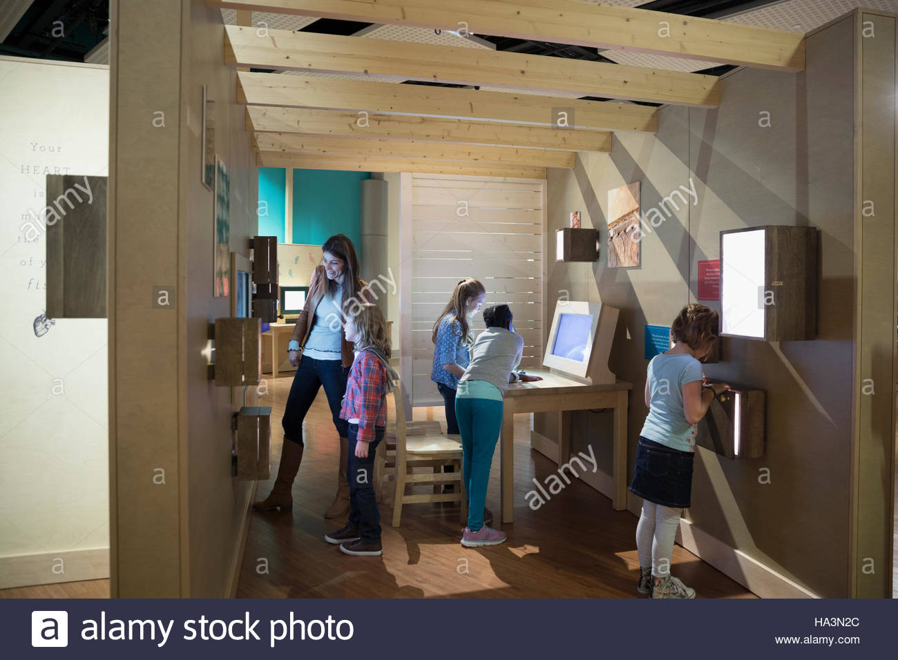 Woman watching children playing in hi-res stock photography and images ...