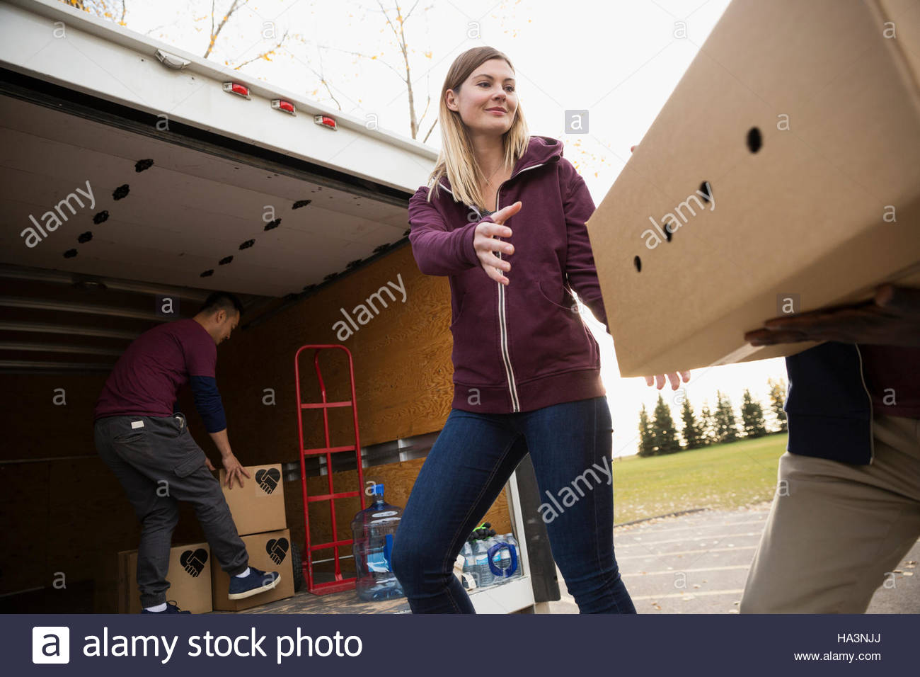 Man loading food box truck hi-res stock photography and images - Alamy