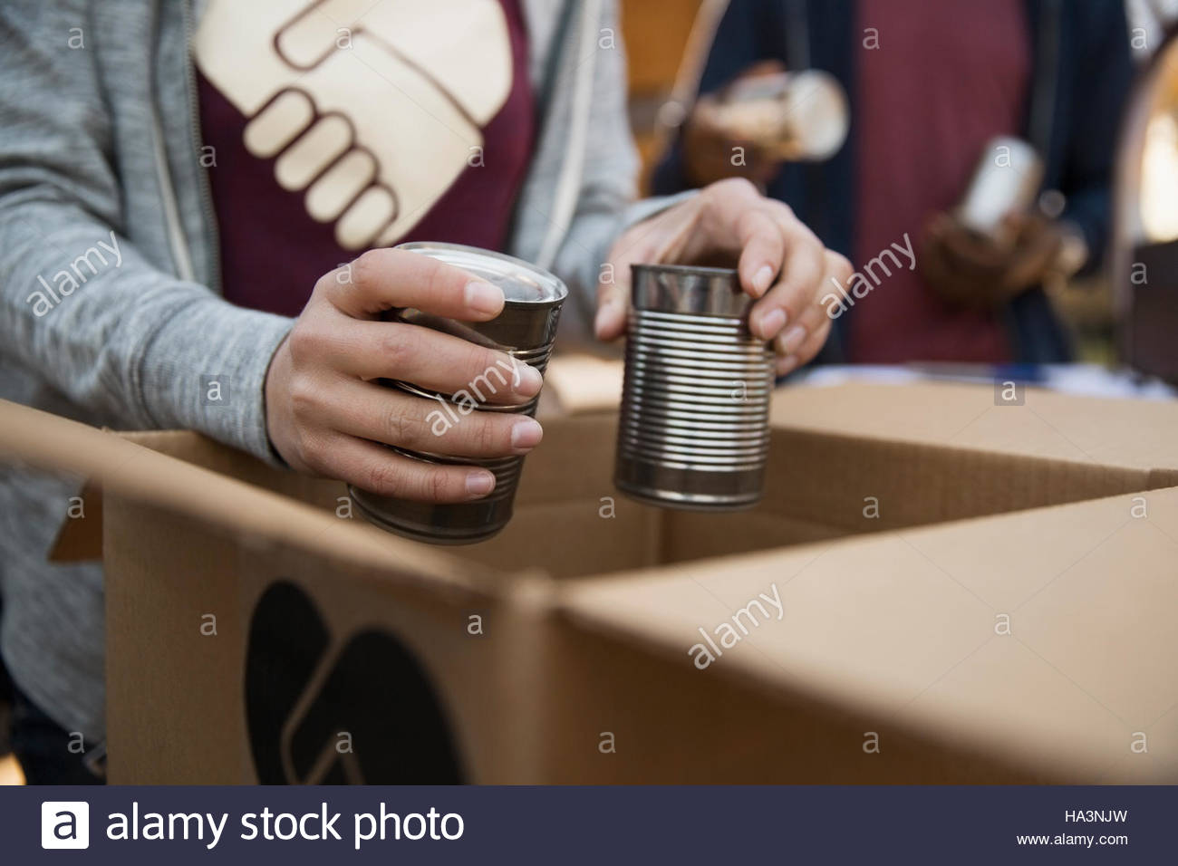 Charity collection tin hi-res stock photography and images - Alamy