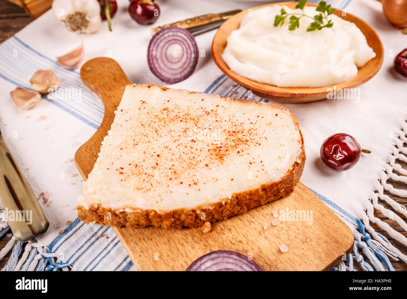 Lard spread on home baked bread with paprika powder Stock Photo - Alamy