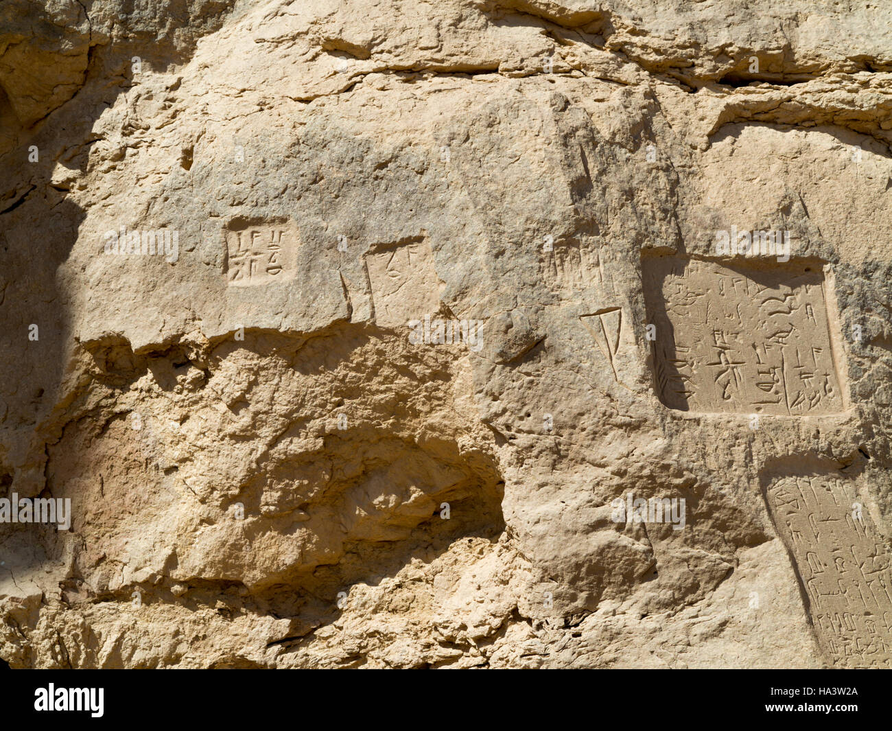 Inscriptions and rock art at Vulture Rock at the entrance to Wadi ...