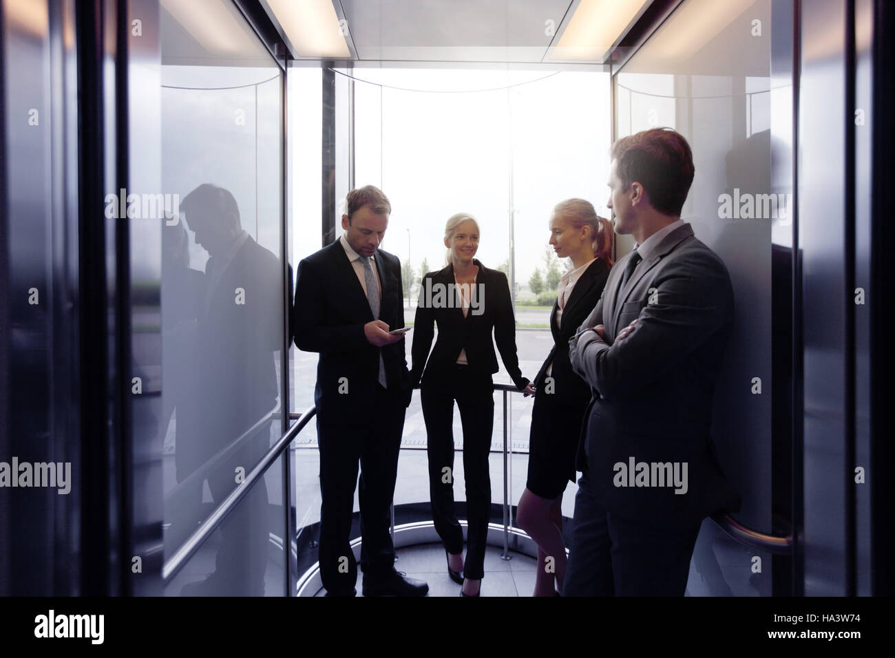 Elevator people hi-res stock photography and images - Alamy