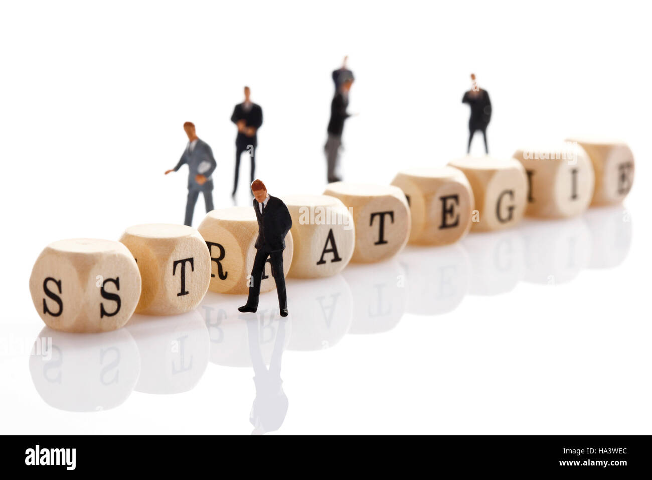 Strategie, German for strategy, written with wooden letters and ...