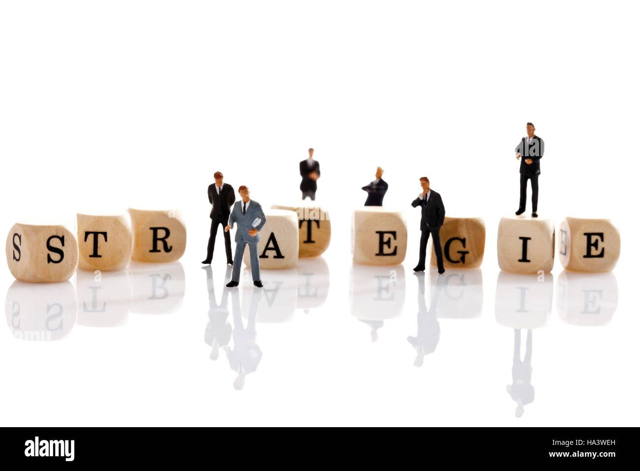 Strategie, German for strategy, written with wooden letters and ...