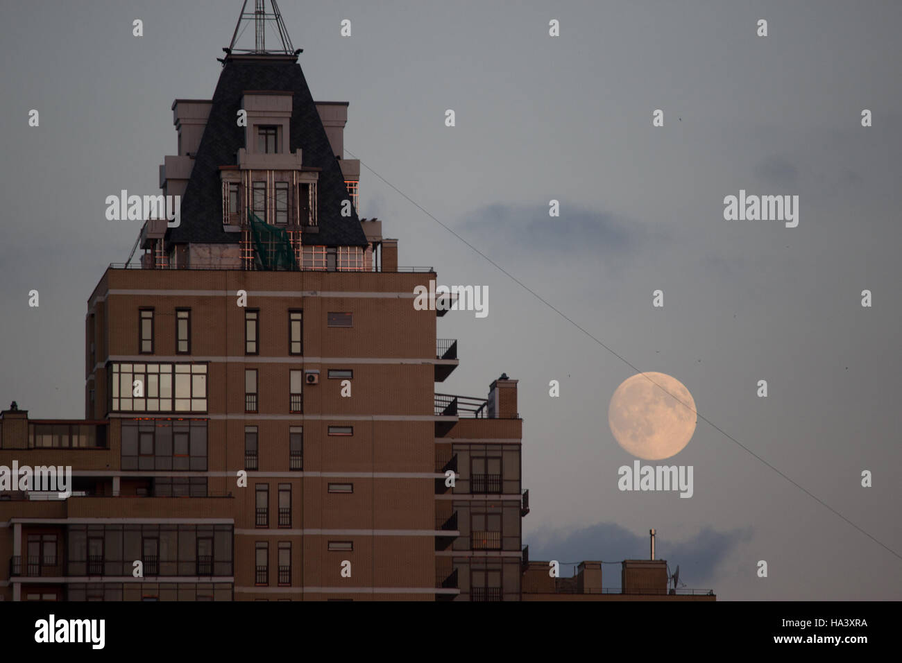 tower and full moon on the sky Stock Photo - Alamy