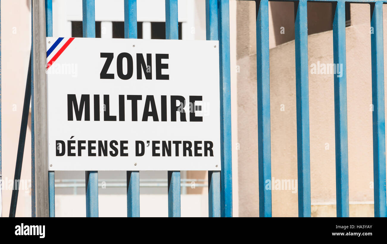 french sign "Military Zone, no entry" on a gate Stock Photo - Alamy