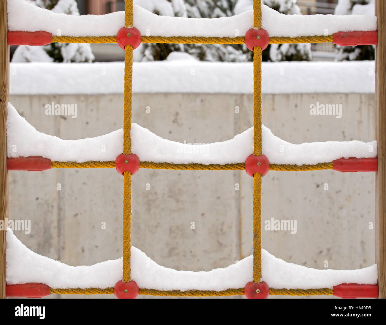 snow on the climb net rope Stock Photo - Alamy