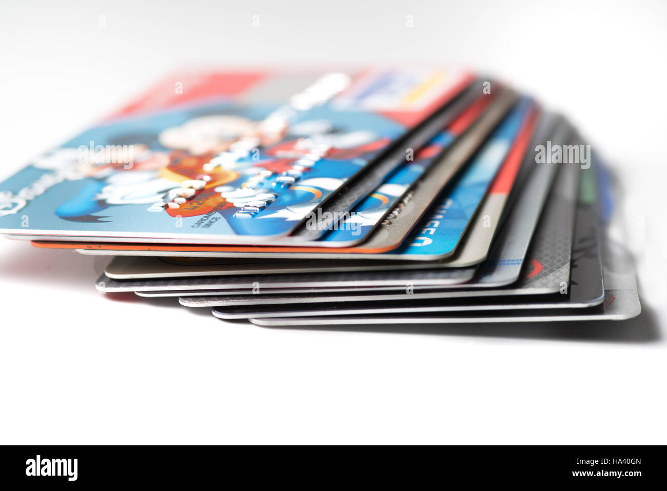 Close up of stack of credit cards on white background,illustrative ...