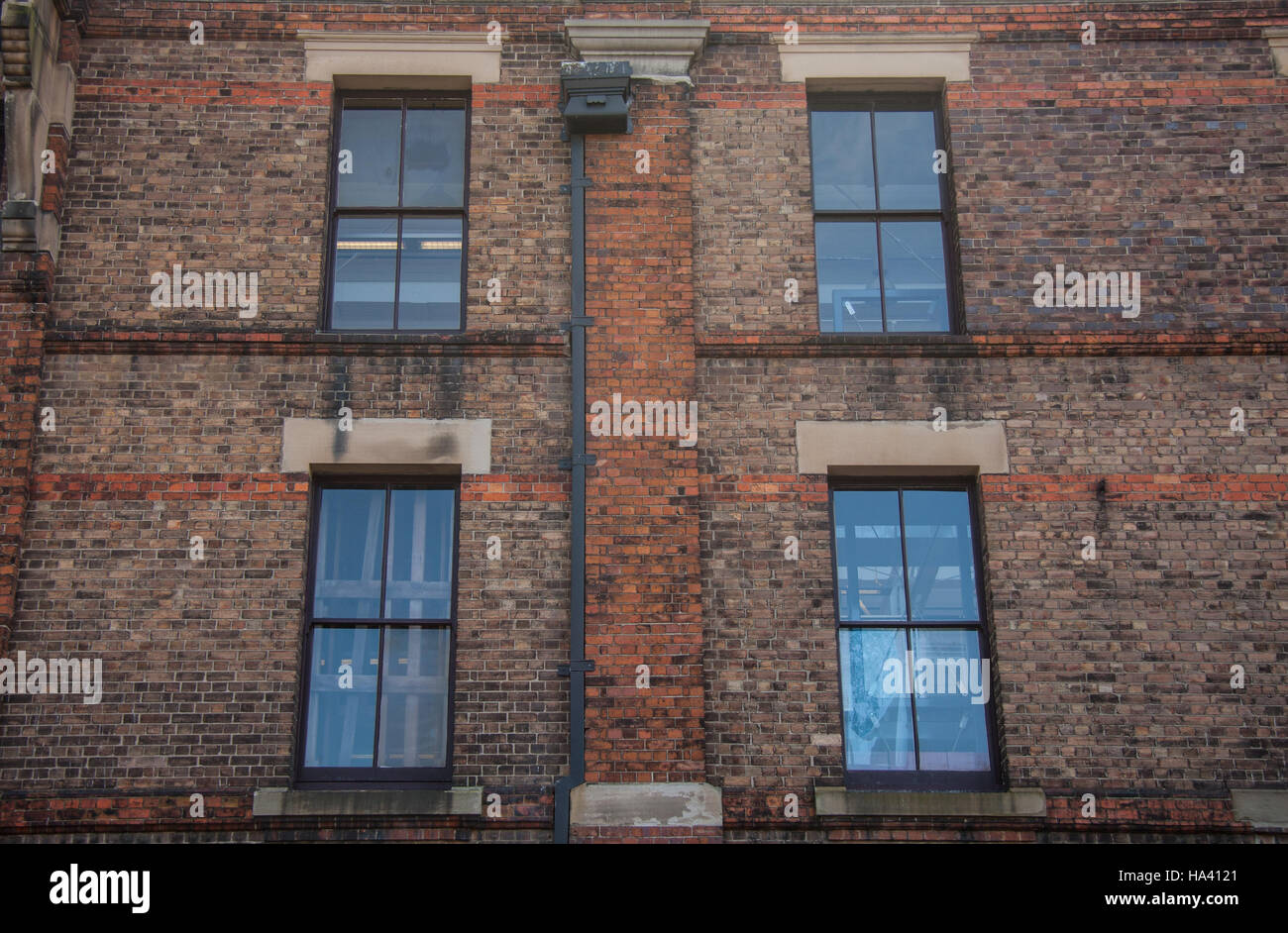 Brick wall window background Stock Photo - Alamy