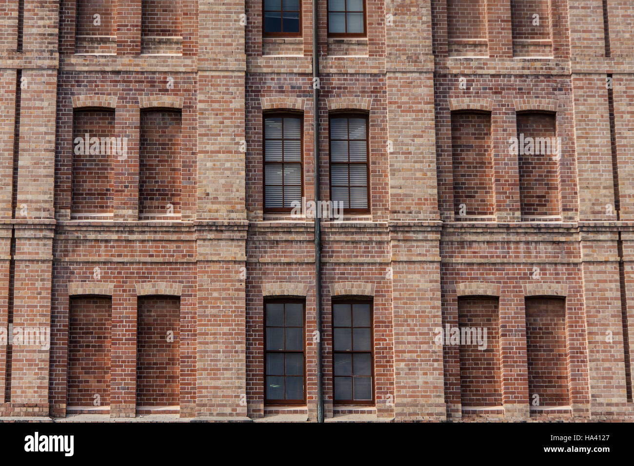 Brick wall window background Stock Photo - Alamy