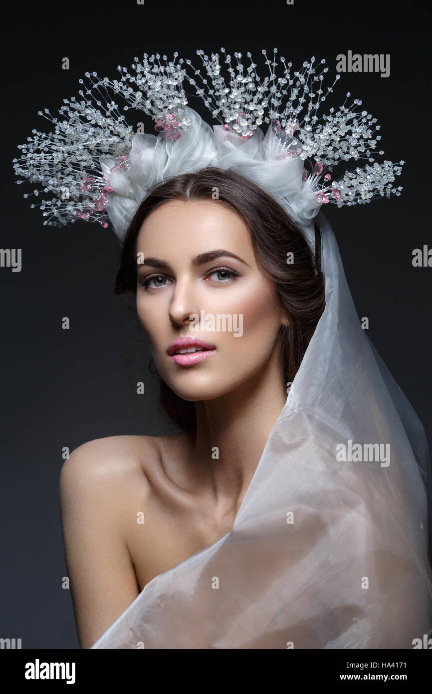 Beautiful girl in crystal crown and veil Stock Photo - Alamy
