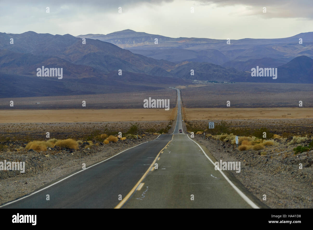 Beautiful straight road landscape around Death Valley National Park ...