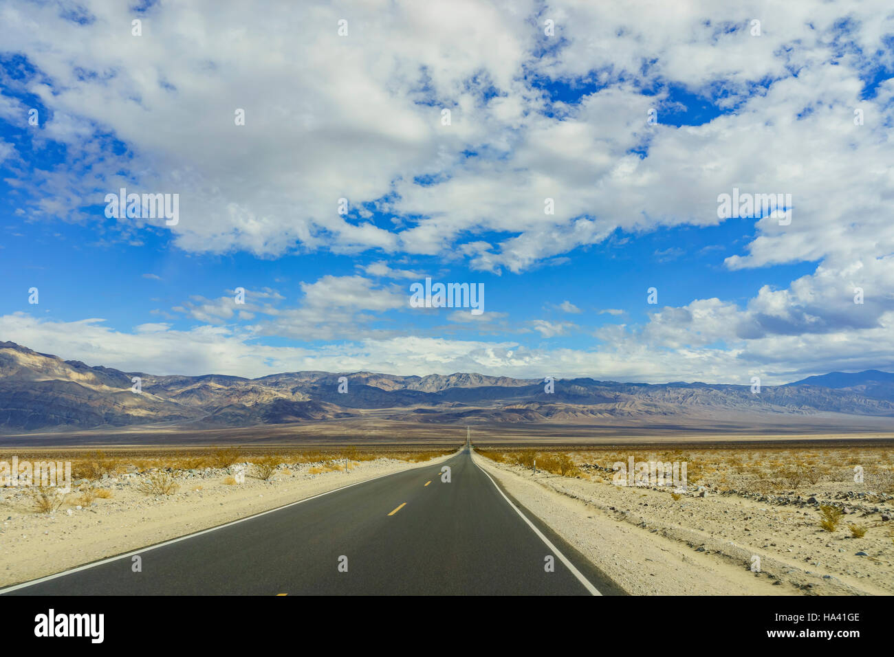Beautiful straight road landscape around Death Valley National Park ...