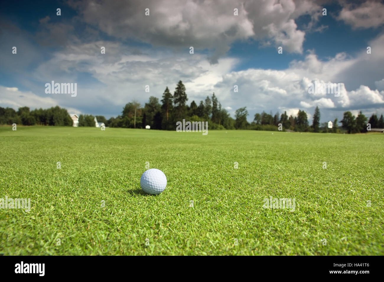 Blue golf ball at hole hi-res stock photography and images - Alamy