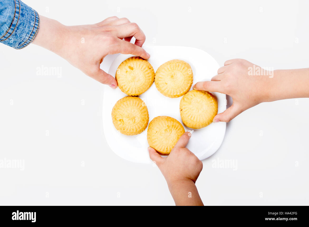 Hands with cookies Stock Photo - Alamy