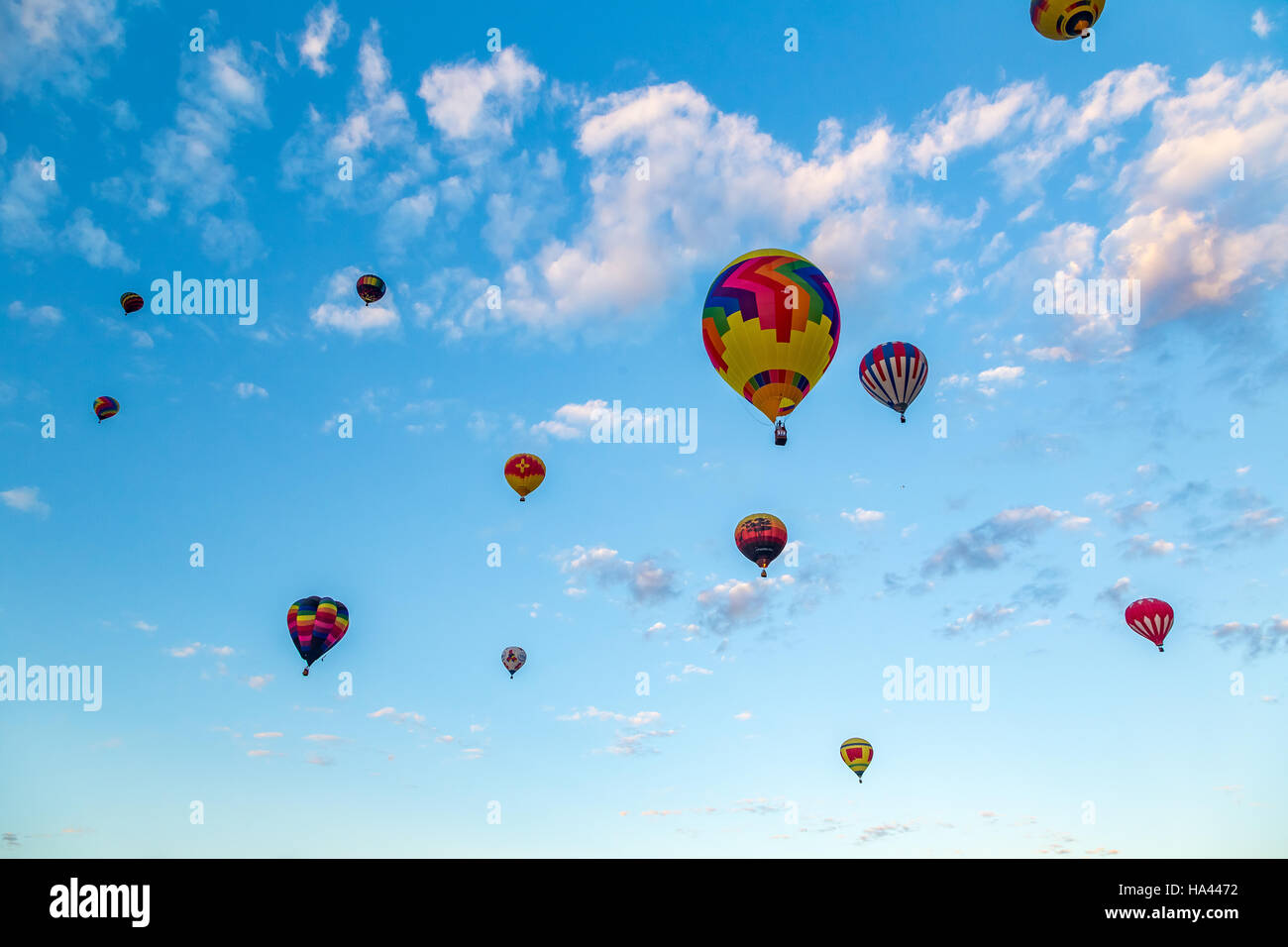 Hot Air Balloons fly over the city of Albuquerque, New Mexico during ...