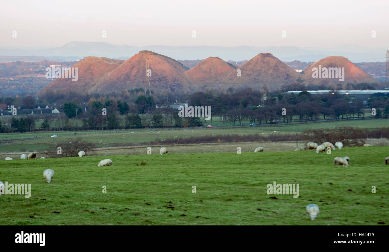 The sun sets on the Five Sisters shale bings at West Calder, West ...