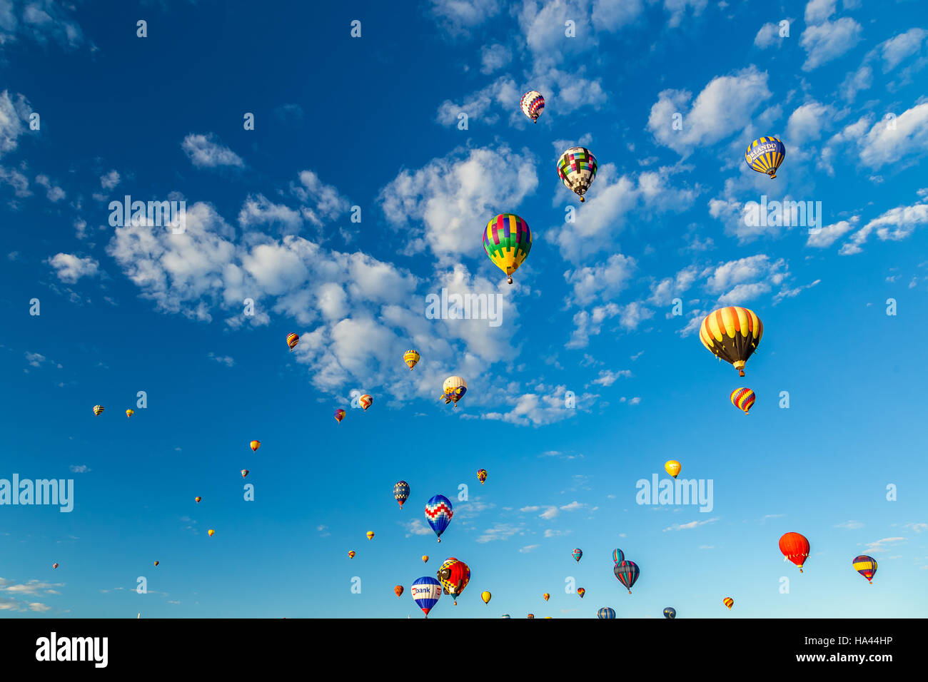 Hot Air Balloons fly over the city of Albuquerque, New Mexico during ...