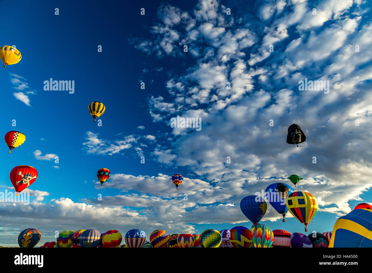 Hot Air Balloons fly over the city of Albuquerque, New Mexico during ...